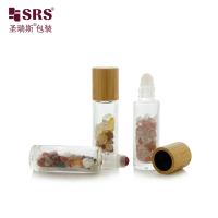 China BLPM-15ML Clear Glass Roll on Bottle Bamboo Cap Natural Crystal Gravel Essential Oil Perfume Cosmetic Roller Container for sale