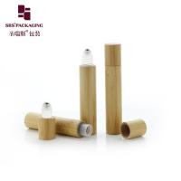 China 8ml Empty Bamboo Roller Bottle Plastic Inner Container With Steel Ball Mini Size Essential Oil Roll On Bottle Laser Logo Available for sale