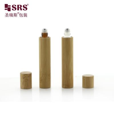 China Portable 10ML Empty Bamboo Roll On With Bamboo Cap Amber Bottle Clear Bottle Window Skylight Design In Stock for sale