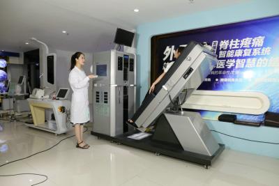 China Silver Non Surgical Spinal Decompression Machine With Touch Screen Computer for sale