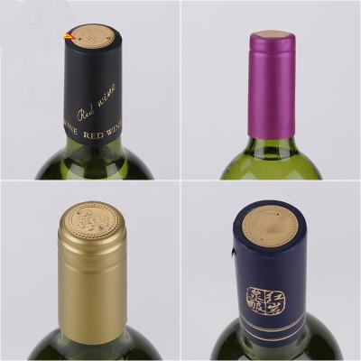 China Best Price 70mic White And Silver Clear PVC Shrink Film For Wine Caps for sale