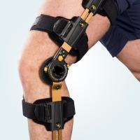 China Telescopic Post Op Mechanical Knee Brace Gold Hinge , Functional Knee Brace for sale