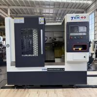 China Slant Bed CNC Lathe Tck40 CNC Lathe Machine CNC Lathe With Bar Feeder for sale