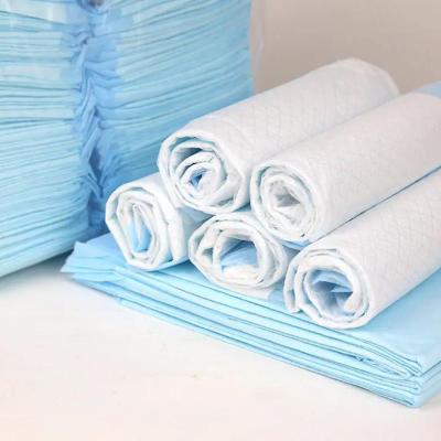 China Disposable Absorbent Pet Training Pads 14g-60g Weight Options S-XL Sizes for Puppy House Training for sale