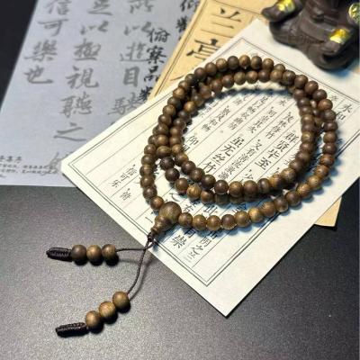China Hainan Natural Agarwood Green Agarwood 0.6+ Circles Old Material with High Oil Content and Water-Sinking Quality for sale