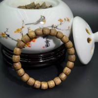 China Natural Agarwood 8mm Drum Bead Bracelet - Qinan Wood with 4-20mm Custom Sizes and Natural Fragrance for sale