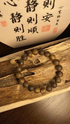 China Cambodian Agarwood 8mm Round Beads Bracelet - 90% Sinking Grade, 22 Pieces Natural Qinan Wood for sale