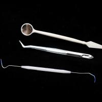 China SJ Dental Consumables Sterilized Disposable Oral Examination Dental Hygiene Kit Dental Examination Kit for sale