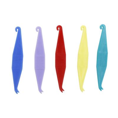 China SJ Multicolor Dental Disposable Plastic Orthodontic Rubber Bands Elastics Placers for Braces for sale