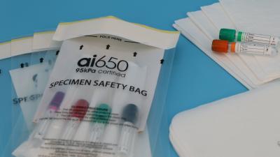 China AI650 Lab Biohazard Specimen Bags With Pocket Orange Logo Releasable Ziplck Waterproof Durable For Sample Transportation for sale