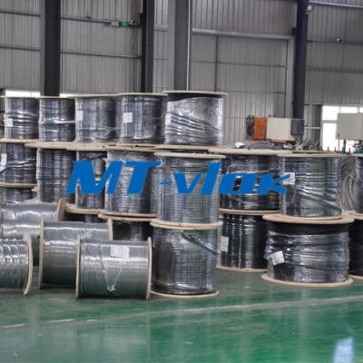 China ASTM A213 4*0.3mm Bright Annealed Super Long Coiled Tubing for sale