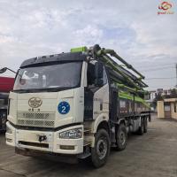 China Zoomlion 56m Boom Reach Concrete Pump Truck With 180 M³/H Output On FAW J6P Chassis for sale