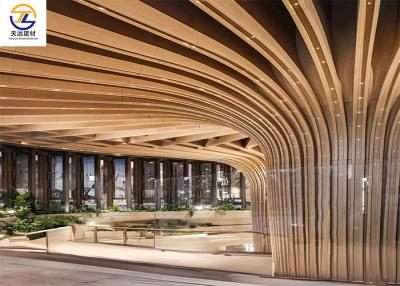 China Custom Curved Wood-Grain Aluminum Louver Ceiling 6063 Alloy 20-100mm Width for Commercial Interiors for sale