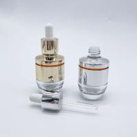 China 30ml 50ml Gold/silver spray essence bottle, essential oil glass bottle, electroplating uv shoulder sleeve dropper bottle for sale