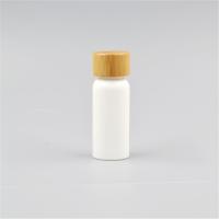 China Plastic 100% PLA biodegradable cosmetic packaging 30g50g100g compostable bottle with bamboo cap for sale