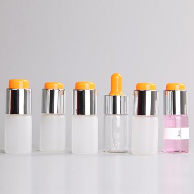 China Matte cosmetic glass lotion face oil bottle foundation packaging 5ml 10ml empty frosted hair serum pump bottle with pump for sale