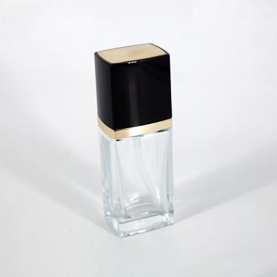 China 30ml 1OZ luxury clear square cosmetic flat liquid bottle foundation serum glass bottle with gold lotion pump for sale