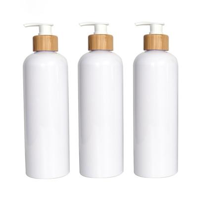 China Empty 250ml 200ml 300ml 500ml 4oz Luxury Shower Body Cosmetic Round Plastic Shampoo White Pet Custom Bamboo Lotion Pump for sale