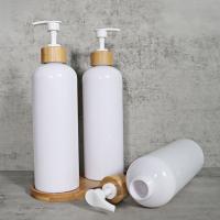China Empty 250ml 200ml 300ml 500ml 4oz Luxury Shower Body Cosmetic Round Plastic Shampoo White Pet Custom Bamboo Lotion Pump for sale