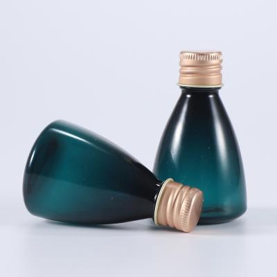 China Empty 30ml 100ml transparent amber plastic lotion shampoo PET bottle with silver aluminum plug cap for sale