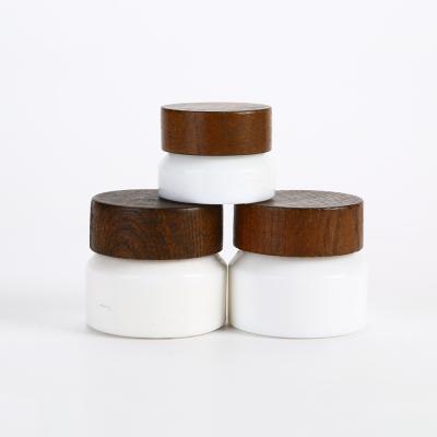 China Cosmetic Cream Bottle White Porcelain Glass Bottle Cream Bottle With Bamboo Lid or Wooden Lid  5g 10g 15g 30g 50g 100g for sale