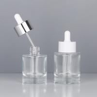 China Transparent/Frosted Super Thick Bottom Flat Shoulder Round 30ml Serum Essence Pump Dropper Glass Bottles for sale