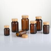 China 60ml 100ml 120ml 150ml 200ml 250ml Pill vitamin tablet bottle wide mouth amber glass capsule bottle with bamboo lid for sale