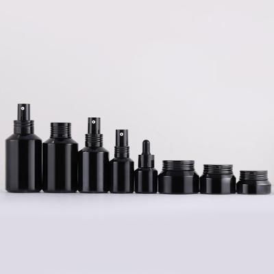 China 15ml 30ml 60ml 120ml 200ml Matte Black Slant Shoulder Glass Cosmetic Lotion Pump Bottles 15g30g50g100g Glass Cream Jars for sale