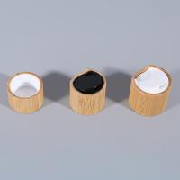 China 20/410 Wooden Bamboo Bottle Cap 24/410 Plastic Shampoo Disc Top Cap Nature Bamboo Flip Top Cap for sale