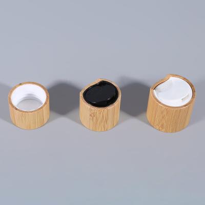 China 20/410 Wooden Bamboo Bottle Cap 24/410 Plastic Shampoo Disc Top Cap Nature Bamboo Flip Top Cap for sale