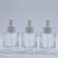 China 20ml 30ml 50ml Clear Flat Square Thick Bottom Serum Glass Dropper Bottle with White Lid for sale