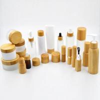 China 15ml 30ml 50ml 100ml 150ml Frost Glass Lotion Bottle With Bamboo Mist Sprayer/Bamboo Lotion Pump/Bamboo Cap for sale