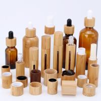 China 15ml 30ml 50ml 100ml 150ml Frost Glass Lotion Bottle With Bamboo Mist Sprayer/Bamboo Lotion Pump/Bamboo Cap for sale