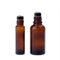 China Brown Glass Roll-on Bottles Empty Refillable Glass Roller Bottles with Stainless Steel Roller Balls for sale