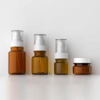 China 8 oz (40-240ml) Amber Frosted Glass Bottle With Pump Head For Beauty Skin Care for sale