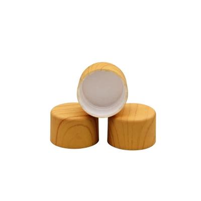 China 24/410 Plastic Wood Grain Caps for sale