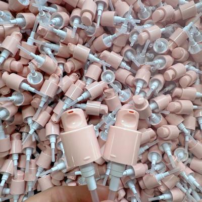 China 24/410 PINK treatment pump for skincare bottle for sale