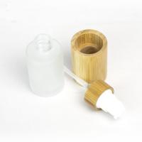 China 30ML/50ML/60ML/100ML/120ML bamboo bottle glass flat shoulder luxury cosmetic packaging bamboo cover for glass spray pump for sale