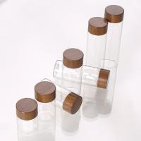 China 24mm, 28mm, 30mm, 65 sealed tube, glass transparent leak-proof bottle, glass 20ml bottle with wood grain plastic cap for sale