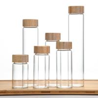 China Bamboo lid medicine bottle, liquid vial, storage jar, glass bottle, airtight jar, bamboo wood lid flower tea jar for sale