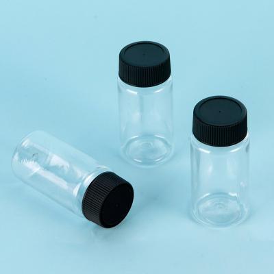 China PE bottle small capacity plastic bottle with black cap, ordinary transparent plastic bottle for sale
