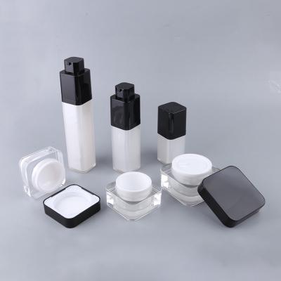 China 30ml 50ml square rotating airless bottle, square round corner cream bottle, black and white acrylic bottle set for sale