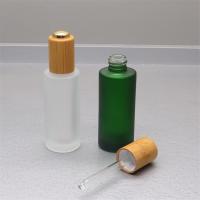 China Ceramic Brown Tea Color Essential Oil Bottle Press Dropper Serum, Bamboo Wood Dropper Cap for sale