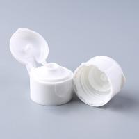 China Plastic 20/24/28 MM flip top cap PP material ball shape flip cap for hand sanitizer/toner/lotion/makeup bottle flip cap for sale