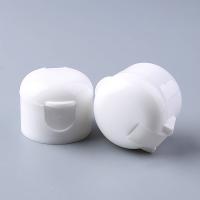 China Plastic 20/24/28 MM flip top cap PP material ball shape flip cap for hand sanitizer/toner/lotion/makeup bottle flip cap for sale