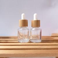 China 15ml dropper glass bottle with bamboo cap，transparent essential oil bottle for sale
