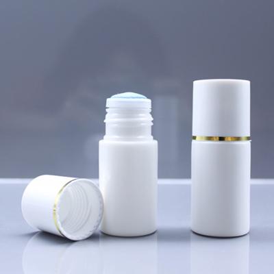 China 20ml 30ml 50ml Round Plastic Sponge Applicator Bottle With Screw Cap Liniment Bottle, gold cover for sale