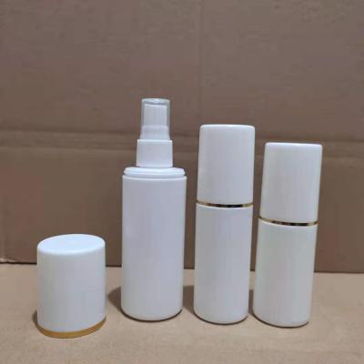China 15ml 30ml 50ml white airless pump lotion bottle with gold Line and clear cap ,50 ml vacuum Cosmetic Container for sale