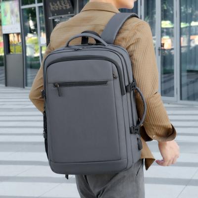 China Customizable Logo Waterproof Anti-Theft Laptop Backpack for Business Travel in Fashionable Blue Black and Lightweight Design for sale