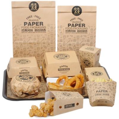 China Disposable Eco-Friendly Kraft Paper Hamburger Rice Takeaway Box 500ml Customizable for sale